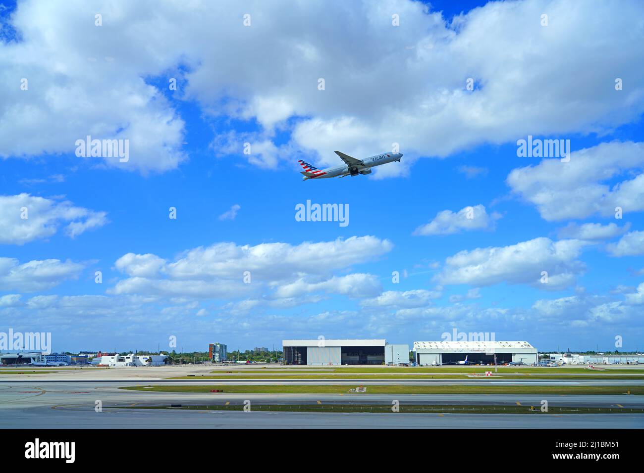 MIAMI, FL -13 MAR 2022- View of an airplane in flight from American ...