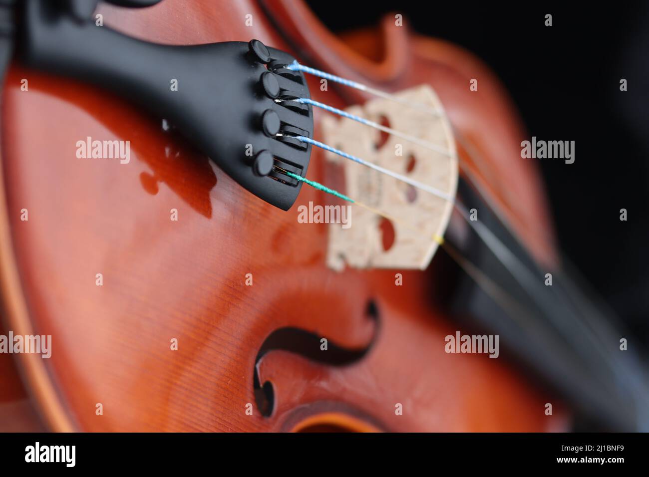 A vertical shot of violin details Stock Photo - Alamy
