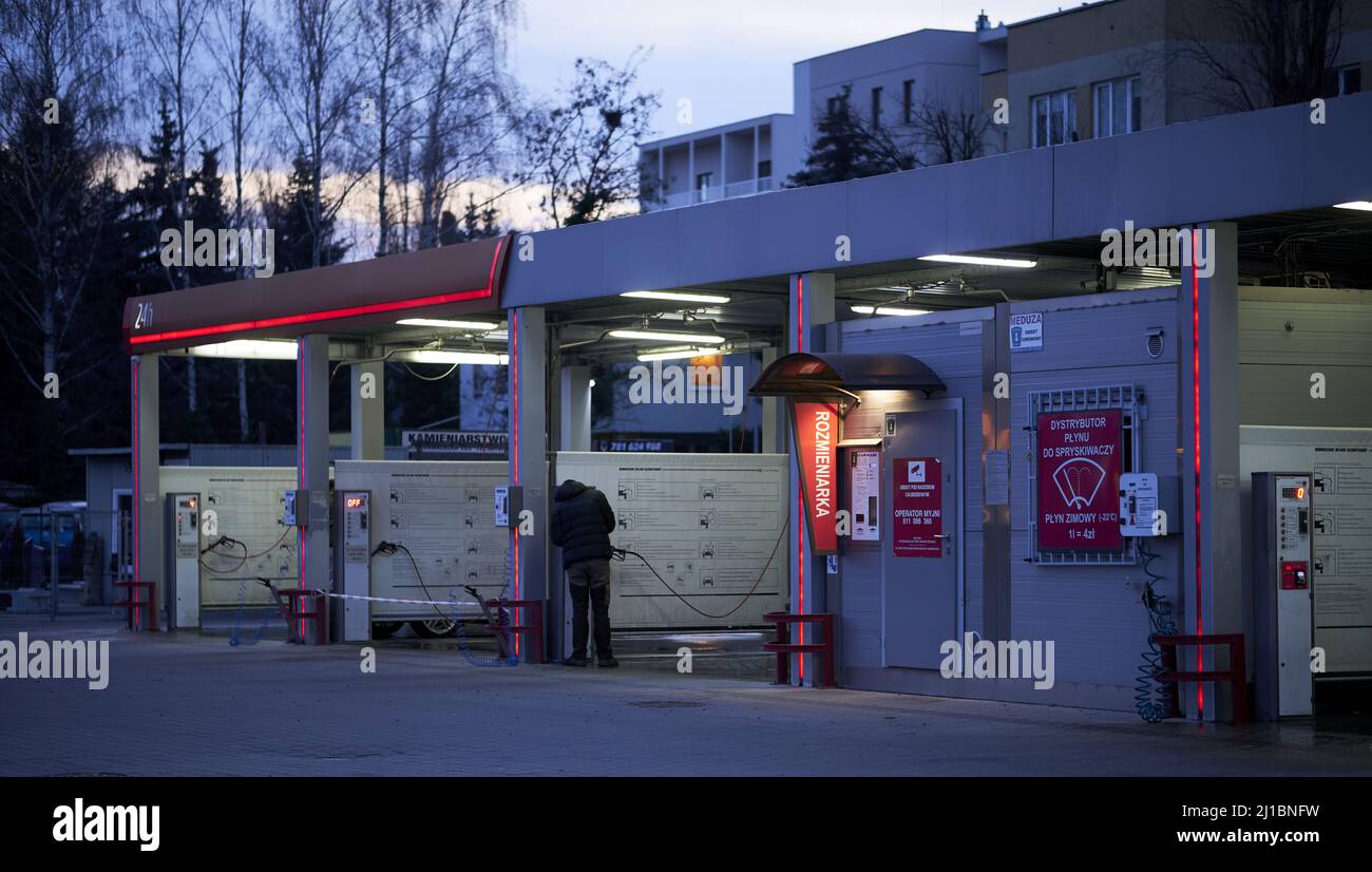 The men washing cars by a car wash at night in Poland Stock Photo - Alamy