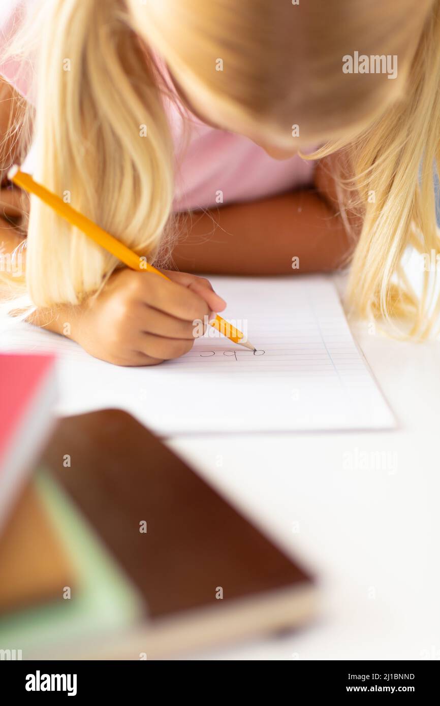 Student girl book writing hi-res stock photography and images - Alamy