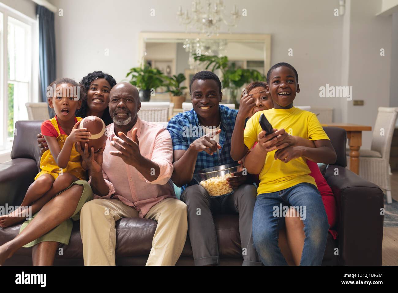 Watching rugby on tv hi-res stock photography and images - Alamy