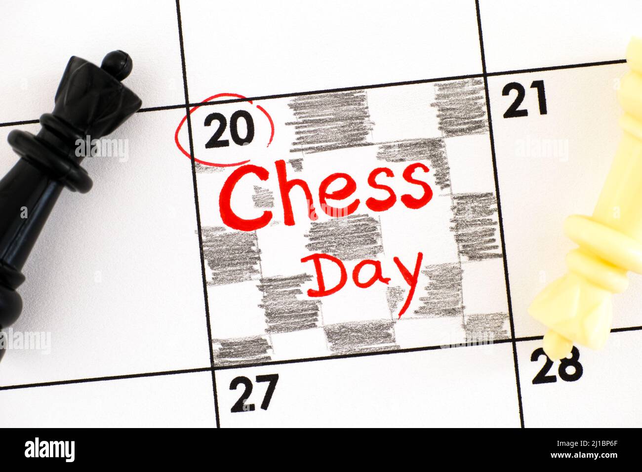 Reminder Chess Day in calendar with black and white chess pieces on it ...