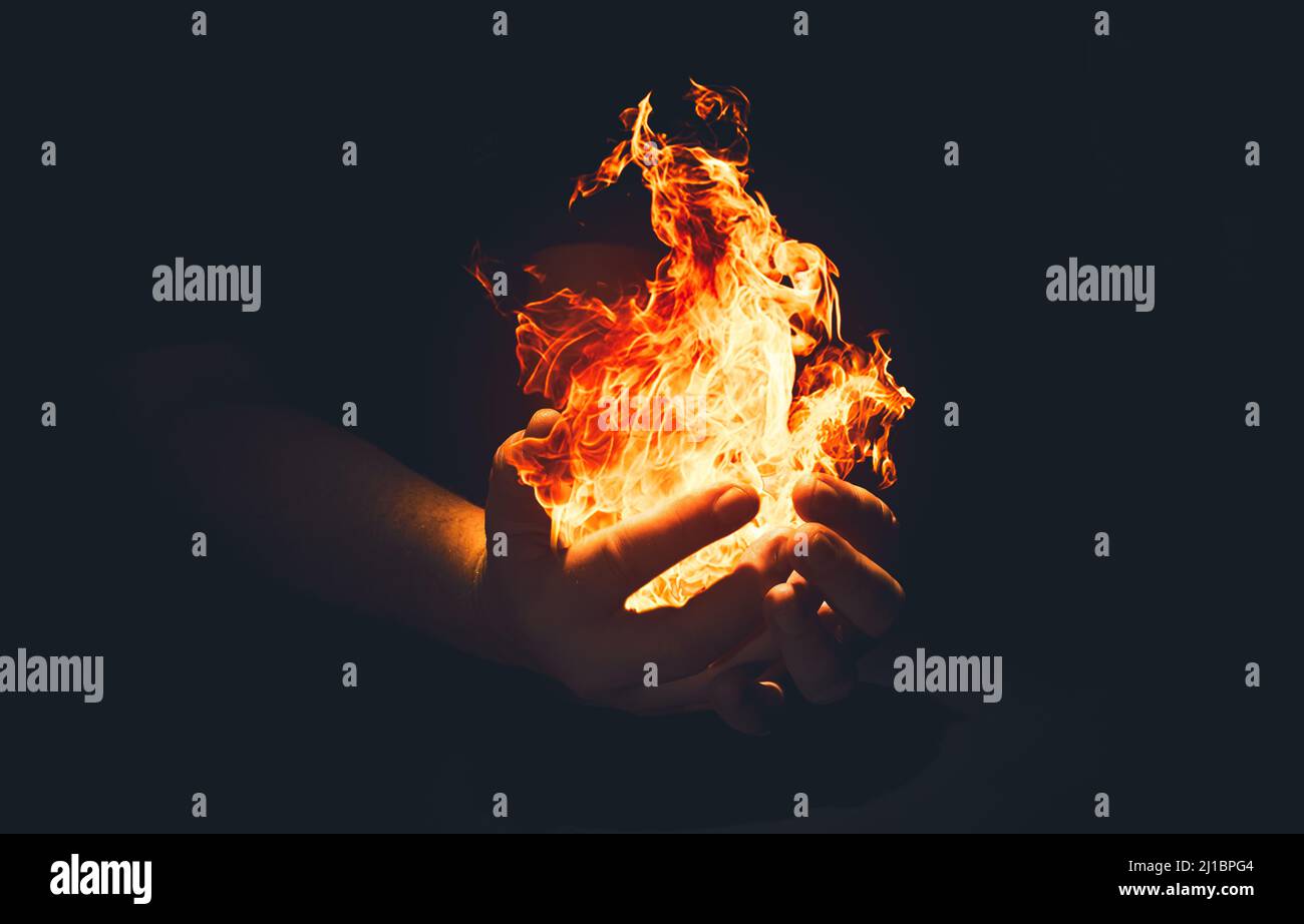 a photo of fire in hands Stock Photo - Alamy