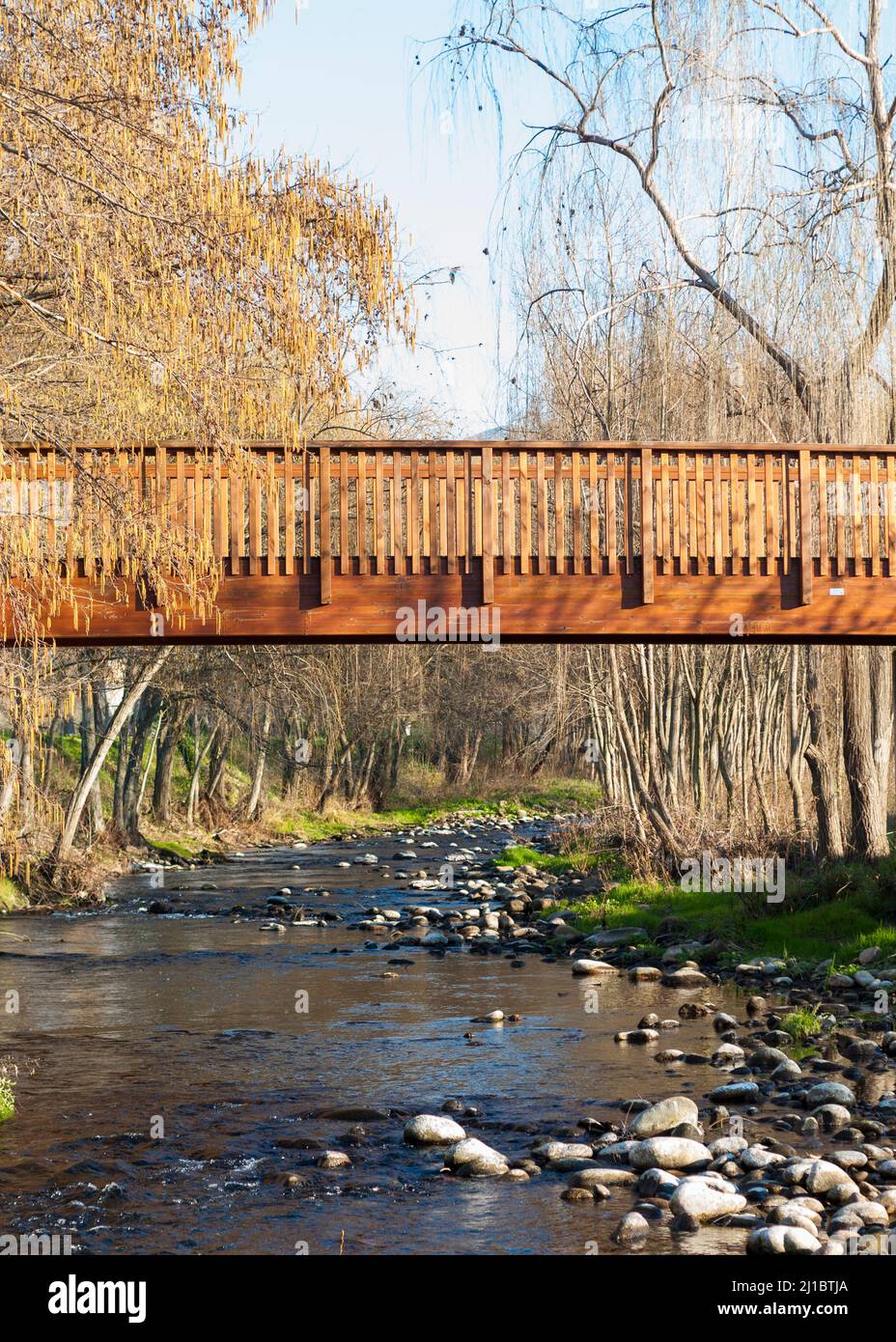 Wooden bridge over the Ambroz river in Abadia Caceres vertical gallery ...