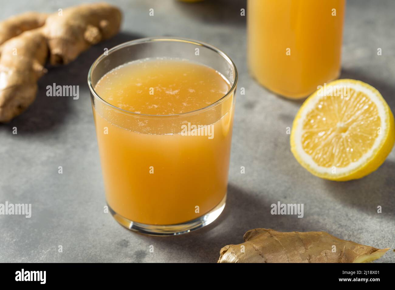 Cold Refreshing Probiotic Ginger Kombucha with Lemon Stock Photo - Alamy