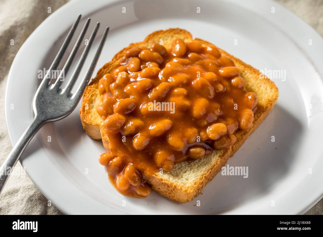 Homemade English Beans on Toast for Breakfast Stock Photo - Alamy