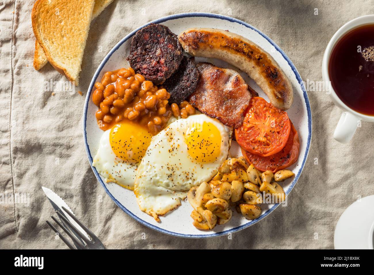 Homemade Full English Breakast with Eggs Sausage Ham and Beans Stock ...