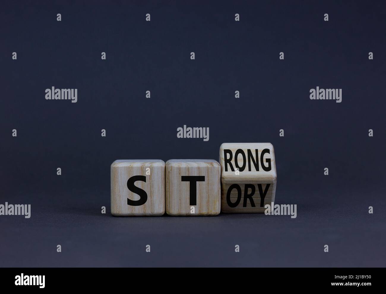 Strong story symbol. Turned the wooden cubes with concept words Strong ...