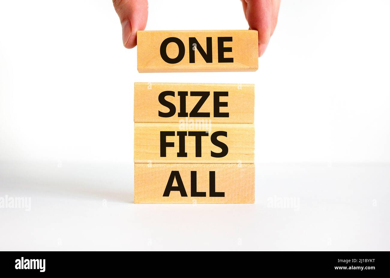 One size fits all symbol. Concept words One size fits all on wooden ...