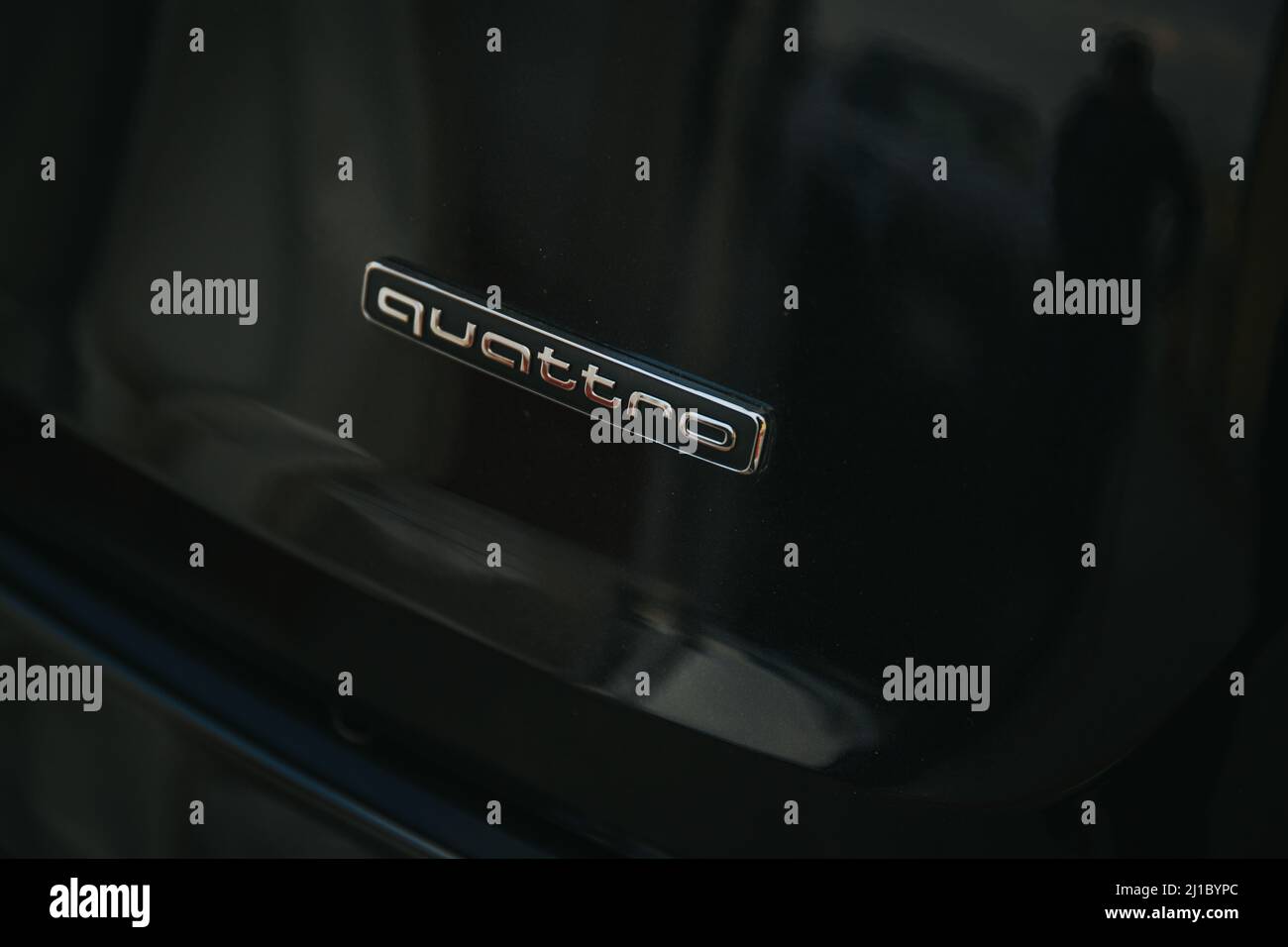 A closeup shot of the Audi Quattro logo on vehicle Stock Photo - Alamy