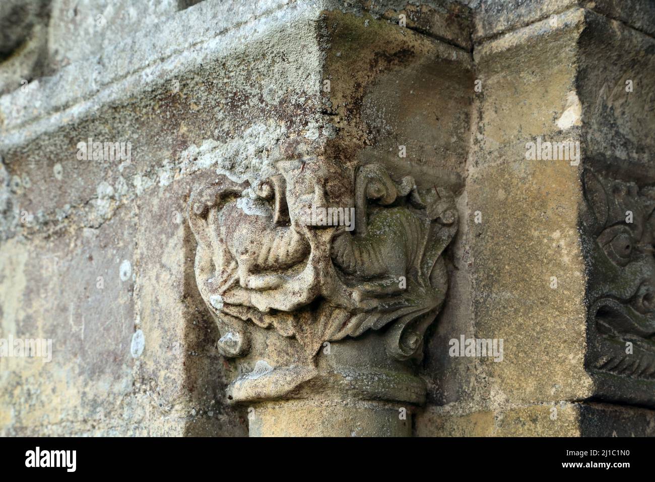 Stone carving on the western abacus of the South Doorway to the church ...