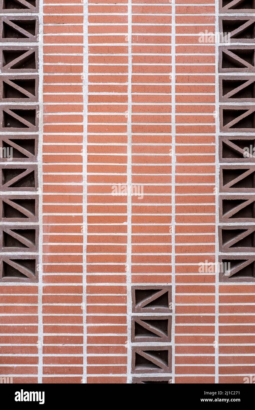Red brick wall with an original design Stock Photo - Alamy
