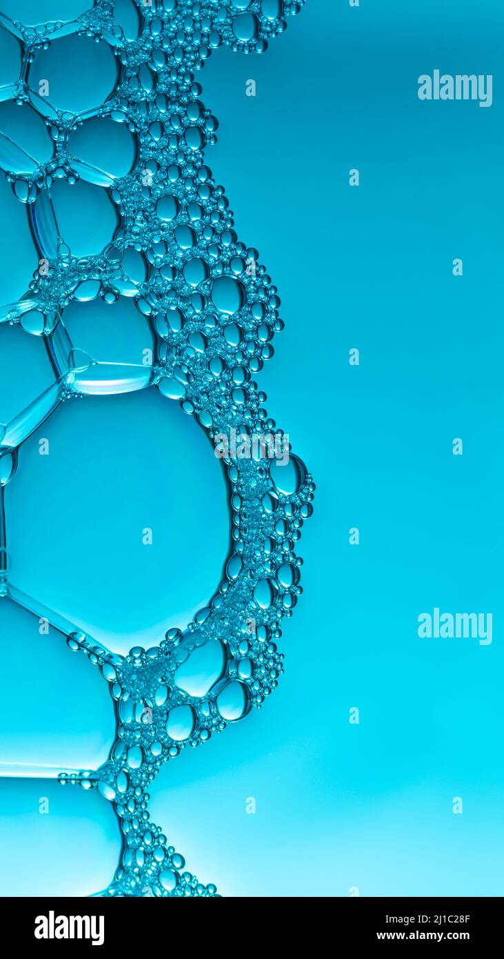 A vertical shot of blue water bubbles texture Stock Photo - Alamy