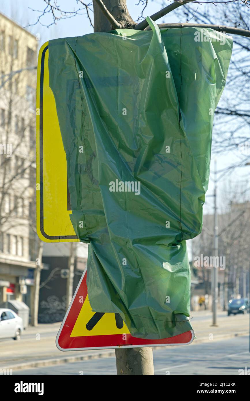 Traffic Signs Temporary Covered With Road Works Tarp in City Stock ...