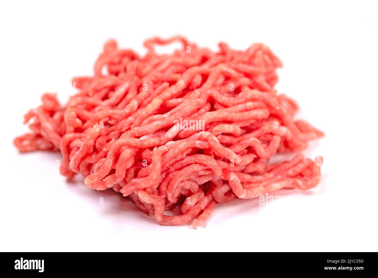 Chopped meat isolated against white background Stock Photo - Alamy