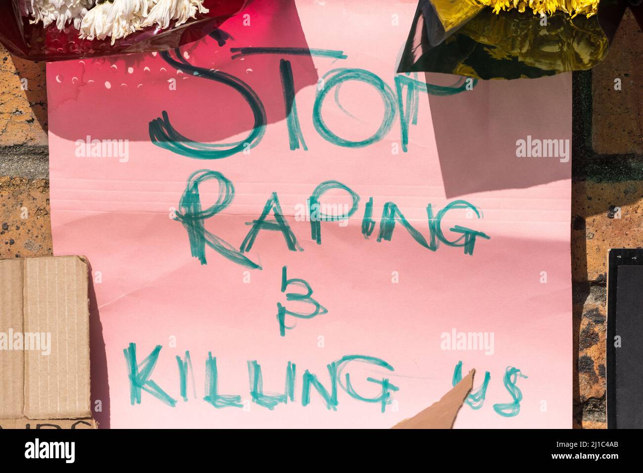 powerful words or text hand written poster on a wall stating stop ...