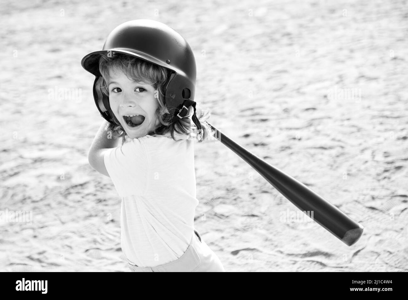 Excited child playing Baseball. Batter in youth league getting a hit ...