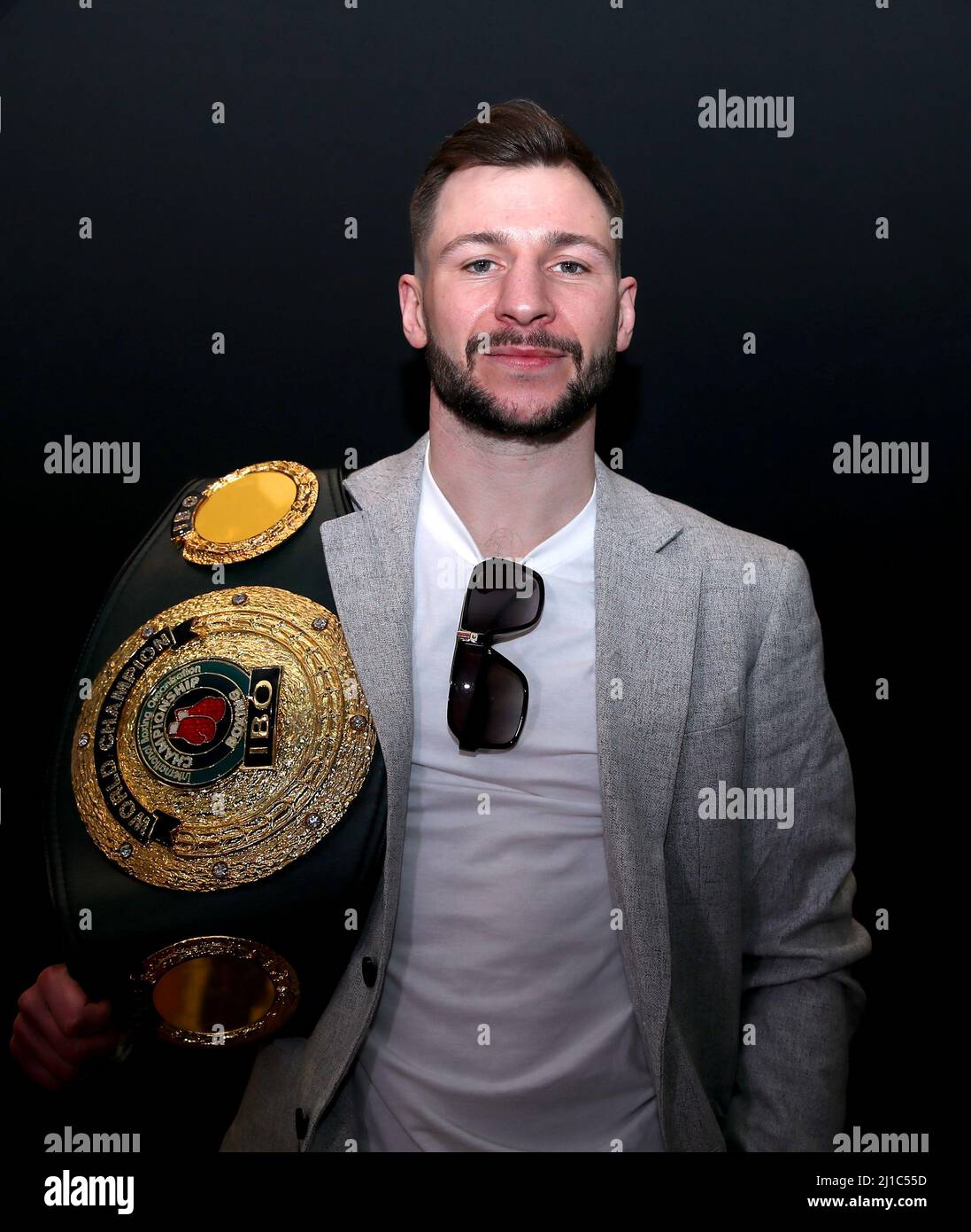 Maxi Hughes poses with his IBO Lightweight title belt after a press ...