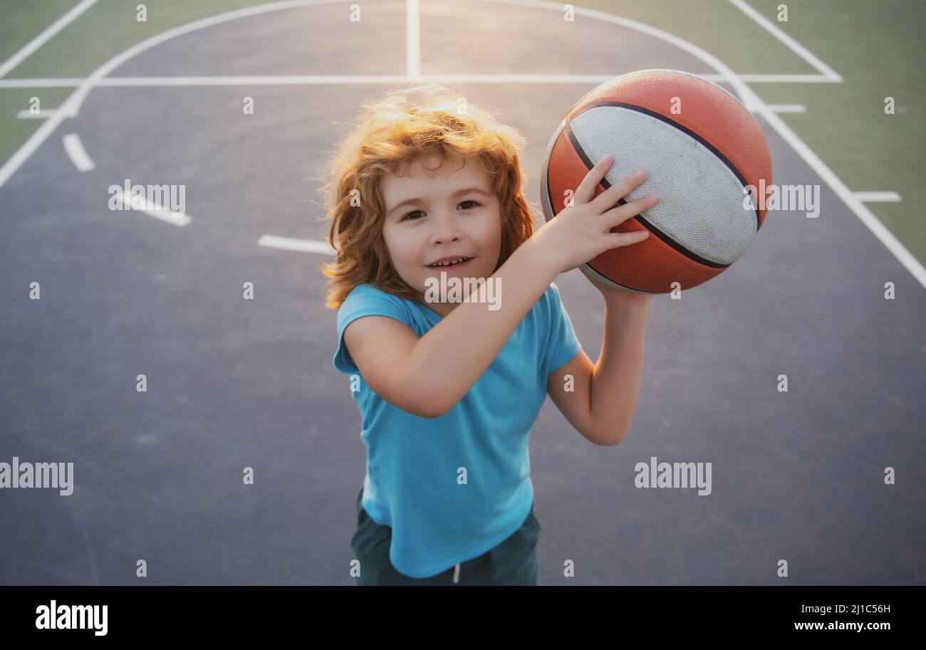 Cute child playing basketball. Sport for kids Stock Photo - Alamy