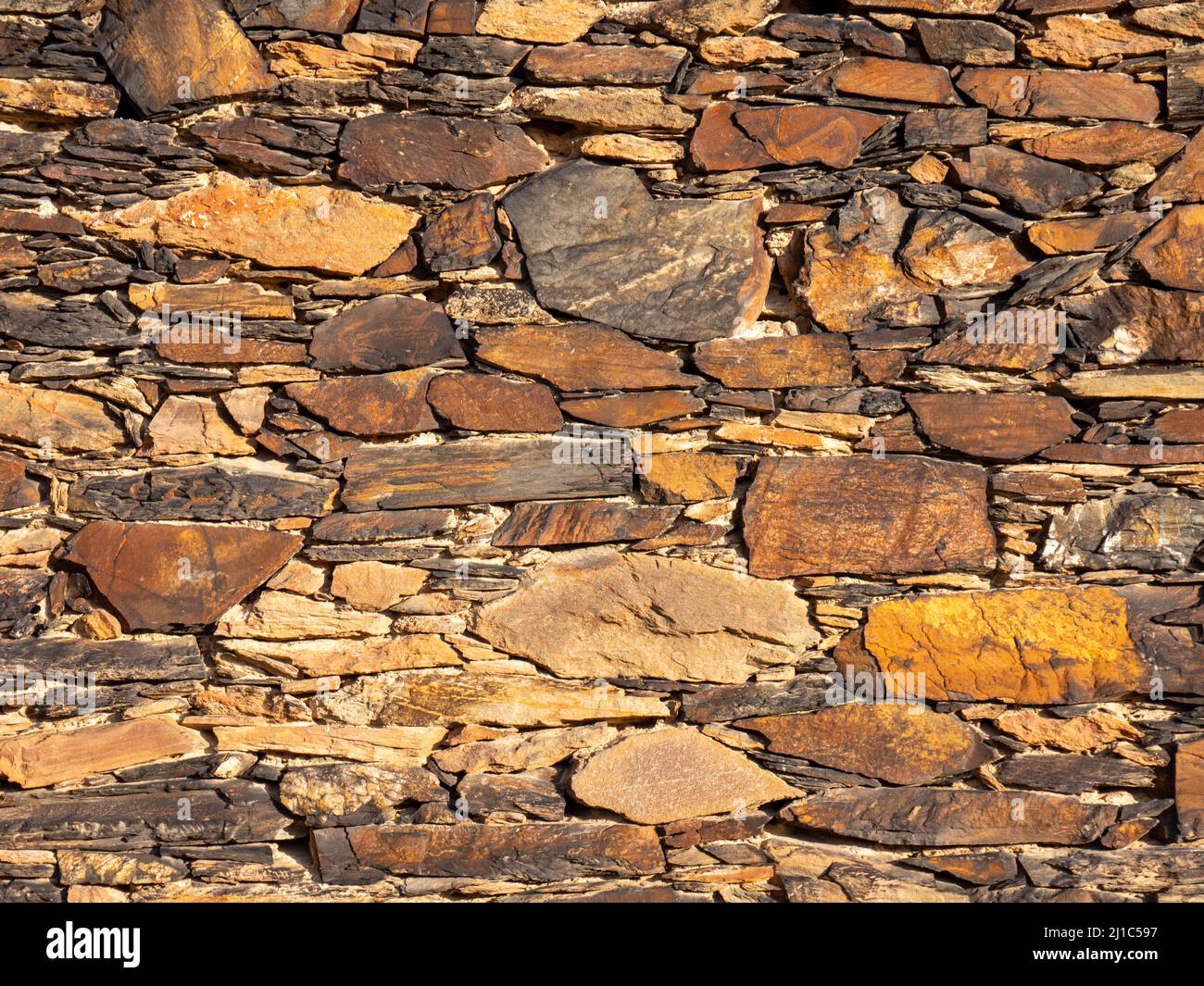 Natural stone wall background texture Stock Photo - Alamy