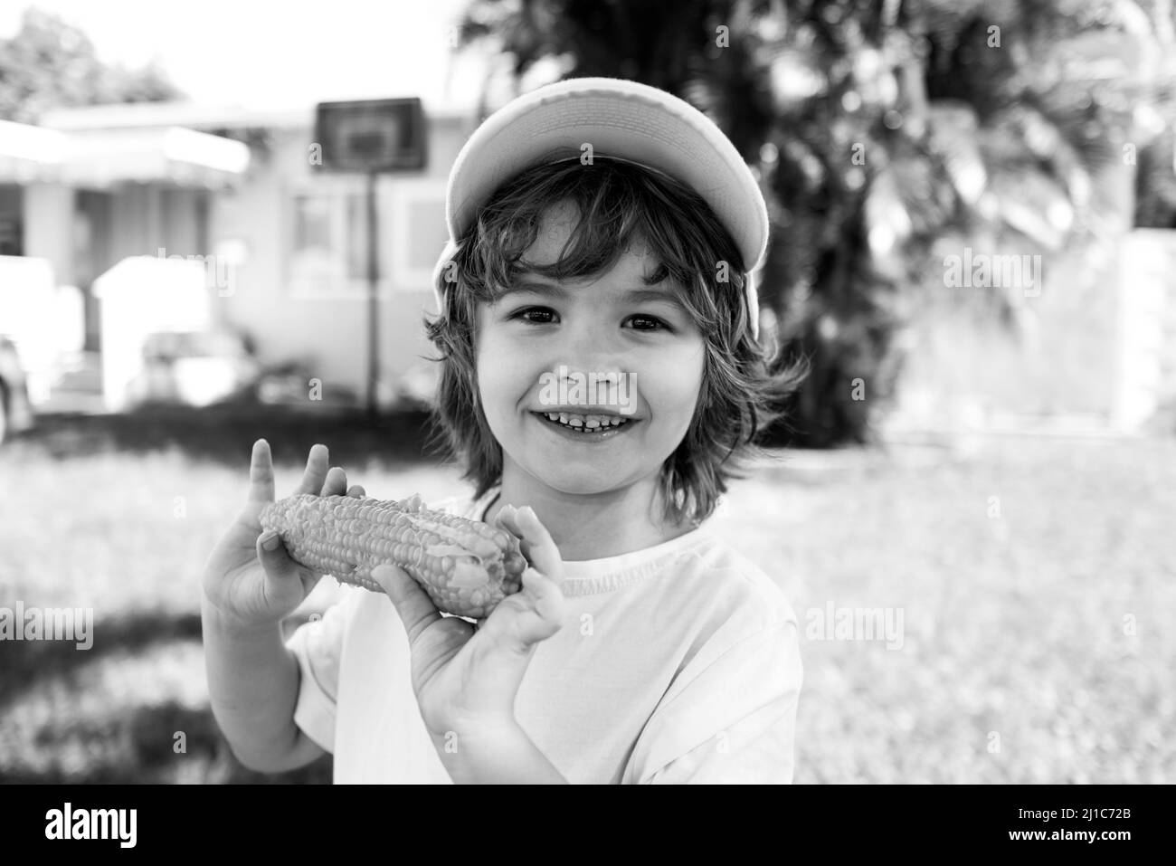 Boy growing corn Black and White Stock Photos & Images - Alamy