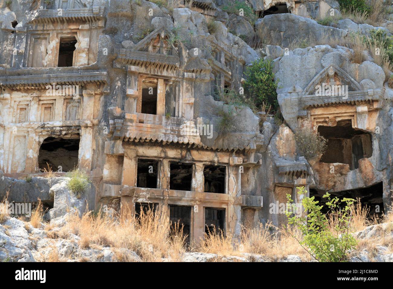 Tombs carved into the rocks in the town of Demre Stock Photo - Alamy