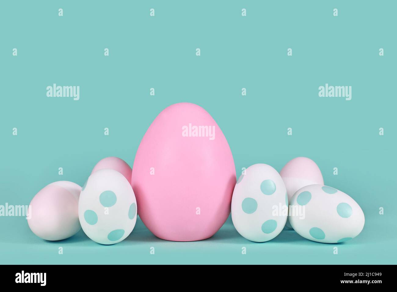 Pink and mint green easter eggs with dots Stock Photo - Alamy