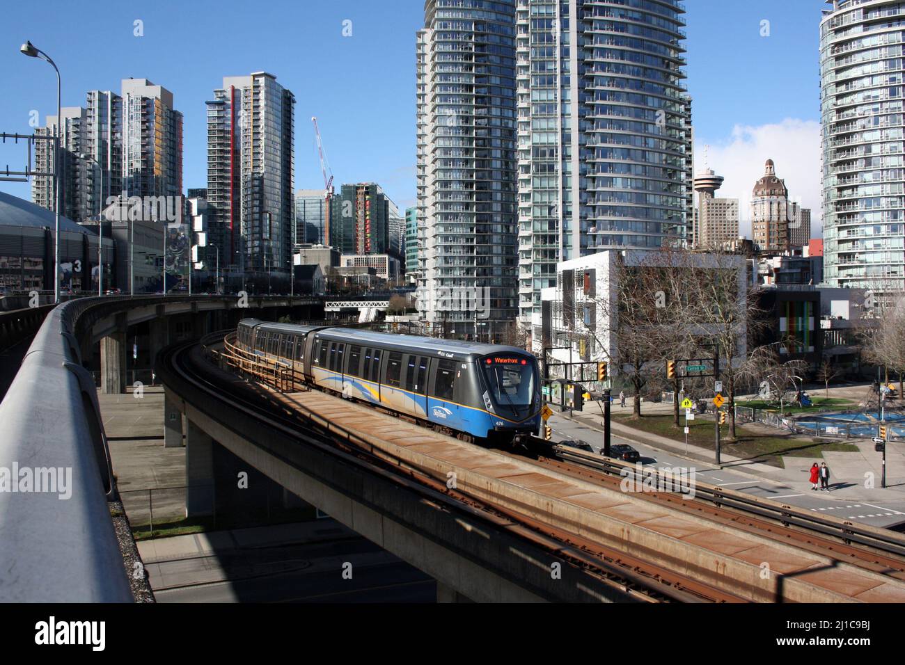 A SkyTrain riding in downtown Vancouver, British Columbia, Canada Stock ...