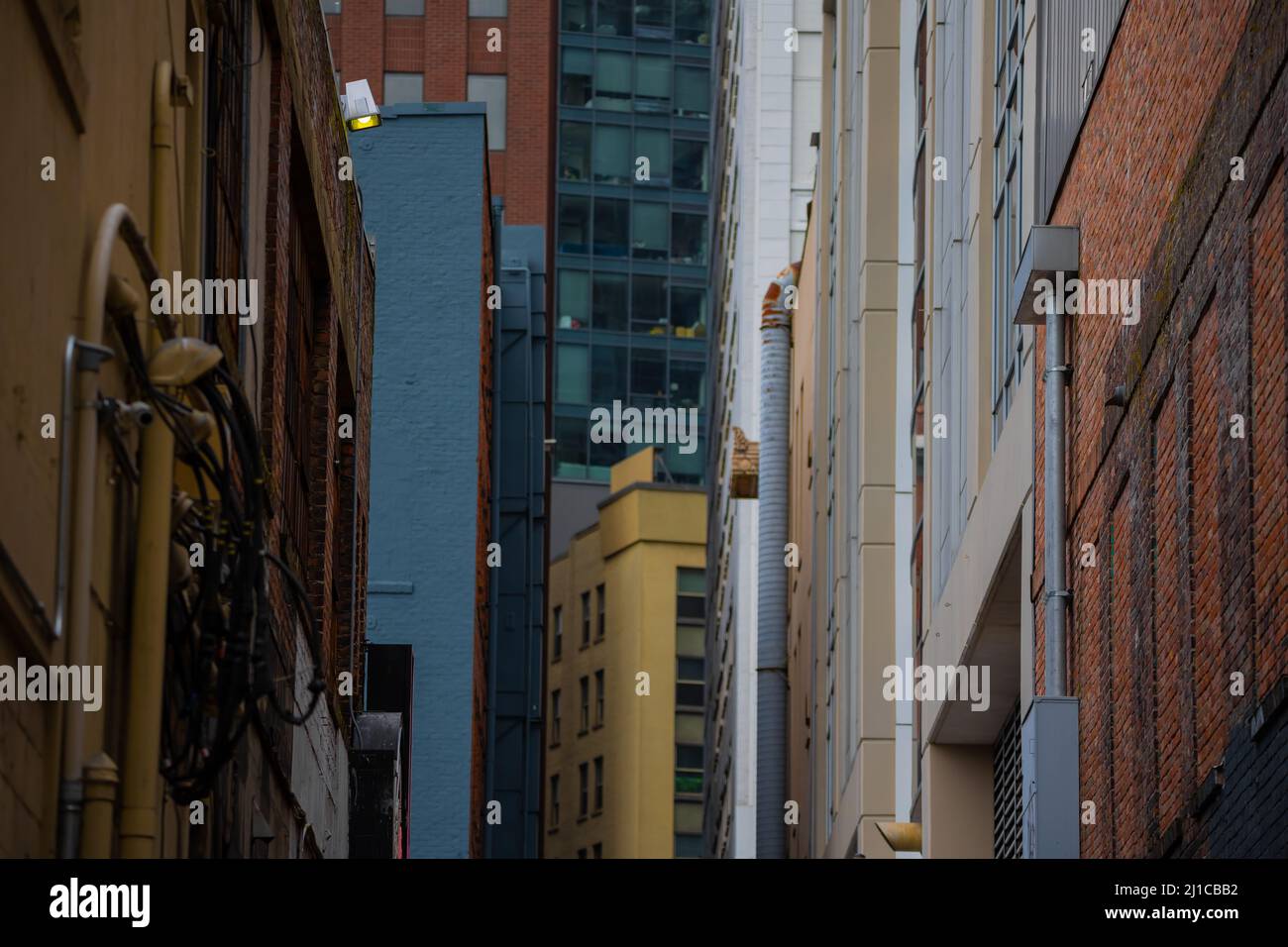 Down up perspective of alleyway showing buildings closing in on ...