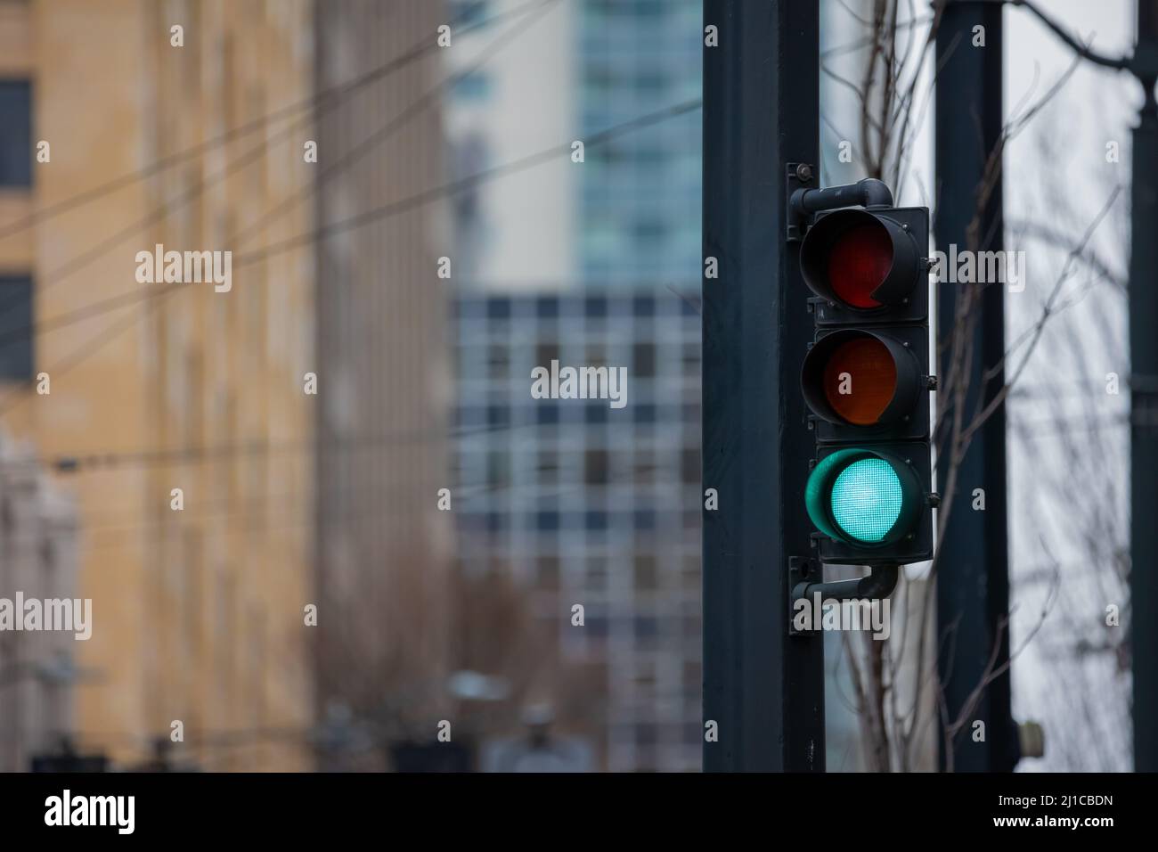 Green light in downtown Seattle with city in background Stock Photo - Alamy