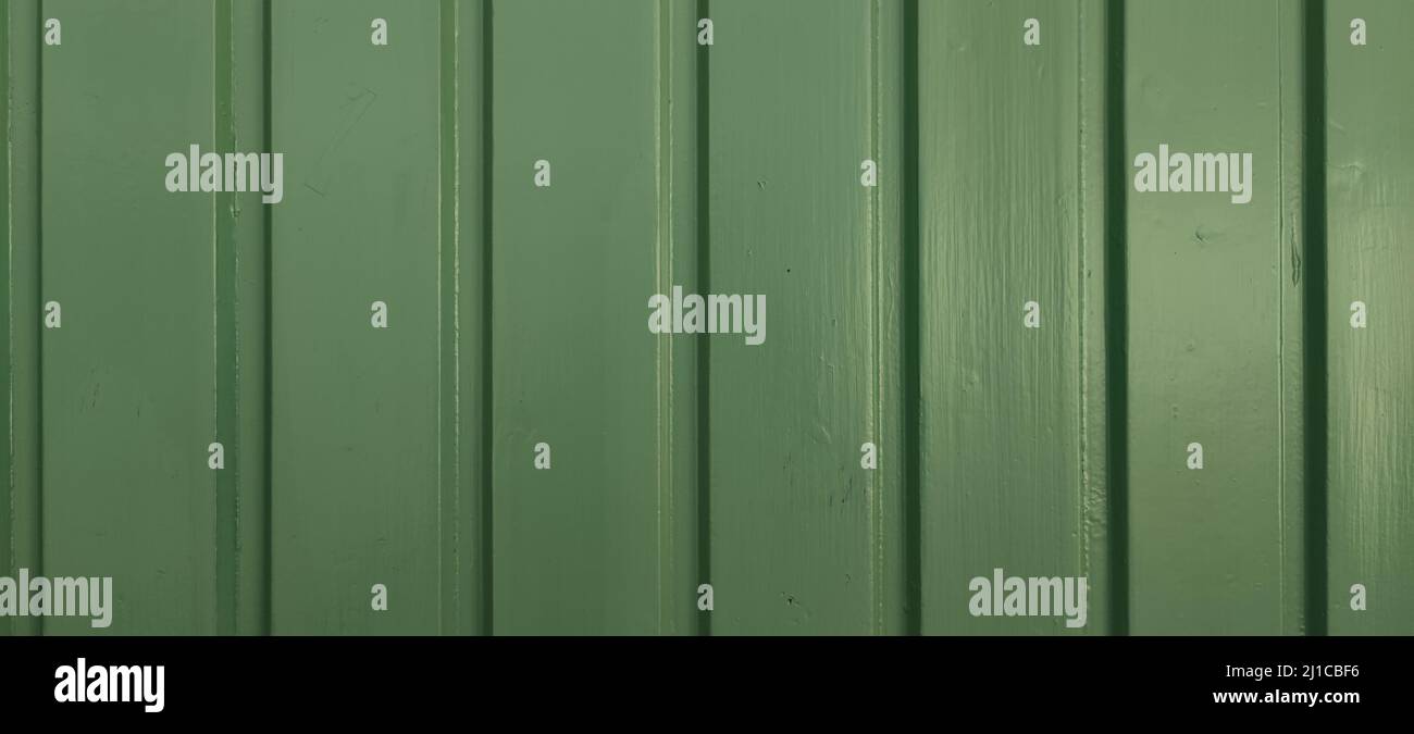 A background of a green wooden gate Stock Photo - Alamy