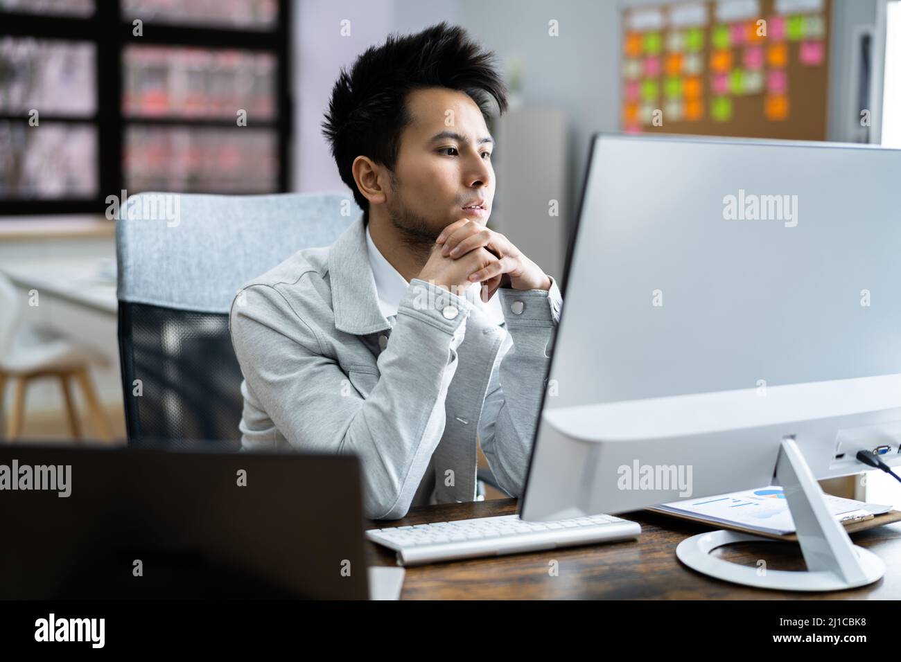 Pondering Thinking Businessman Using Office Computer. Contemplative Man ...