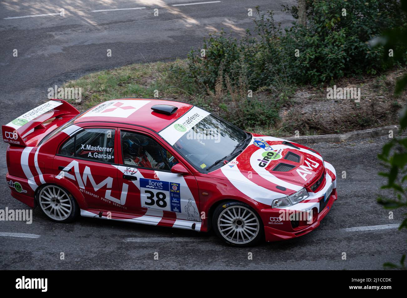 A Mitsubishi Lancer Evolution VI during competition at the Asphalt ...