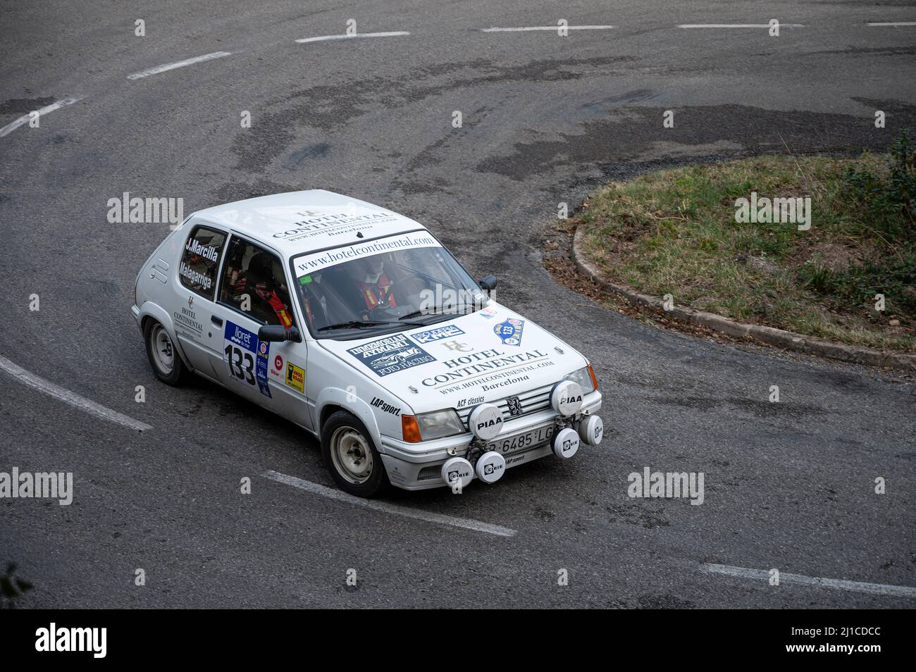 A closeup of a Peugeot 205 Rallye in 9 Lloret de Mar asphalt rally ...