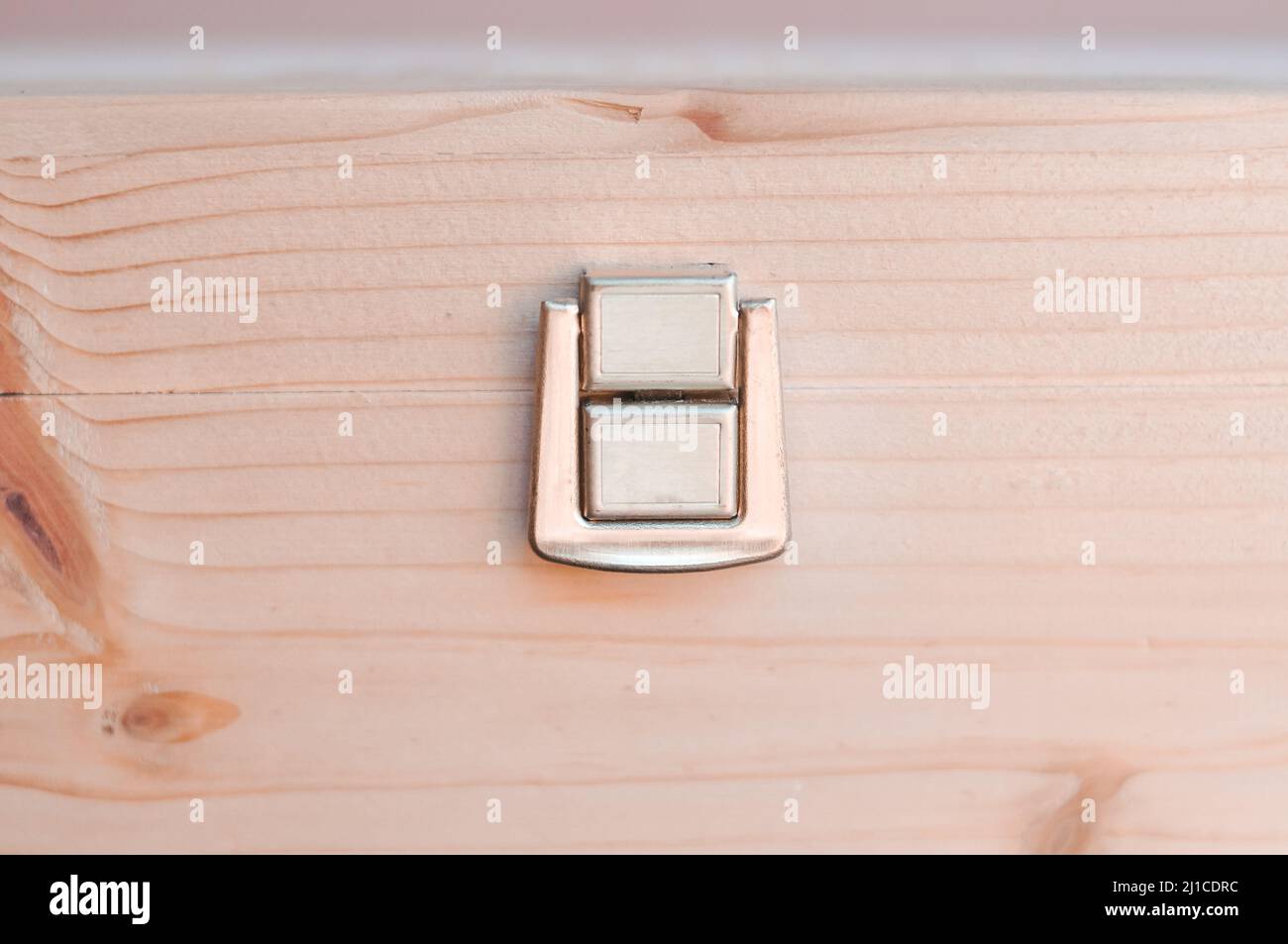 Close up of closed wooden casket with metal lock Stock Photo - Alamy