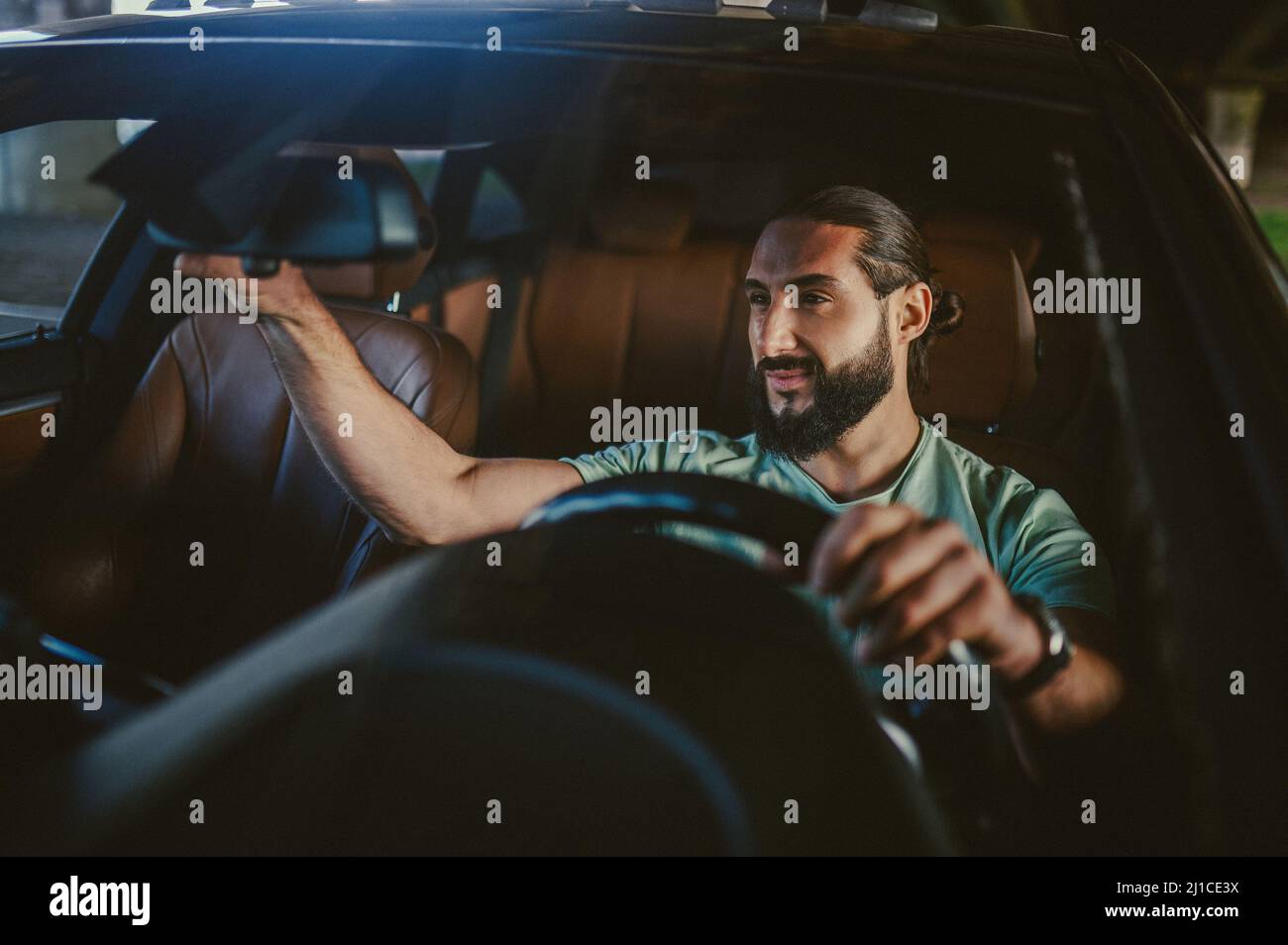 Saudi man driving car hi-res stock photography and images - Alamy