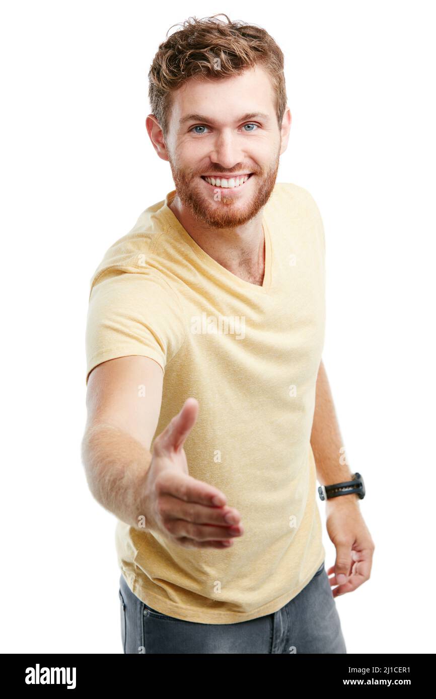 Nice to meet you. Studio portrait of a young man holding out his hand ...