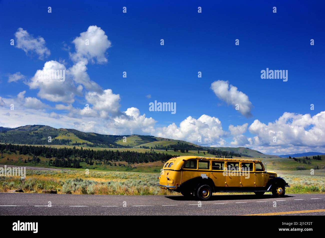 Landmark, yellow Yellowstone automobile gives tourists a unique visit ...