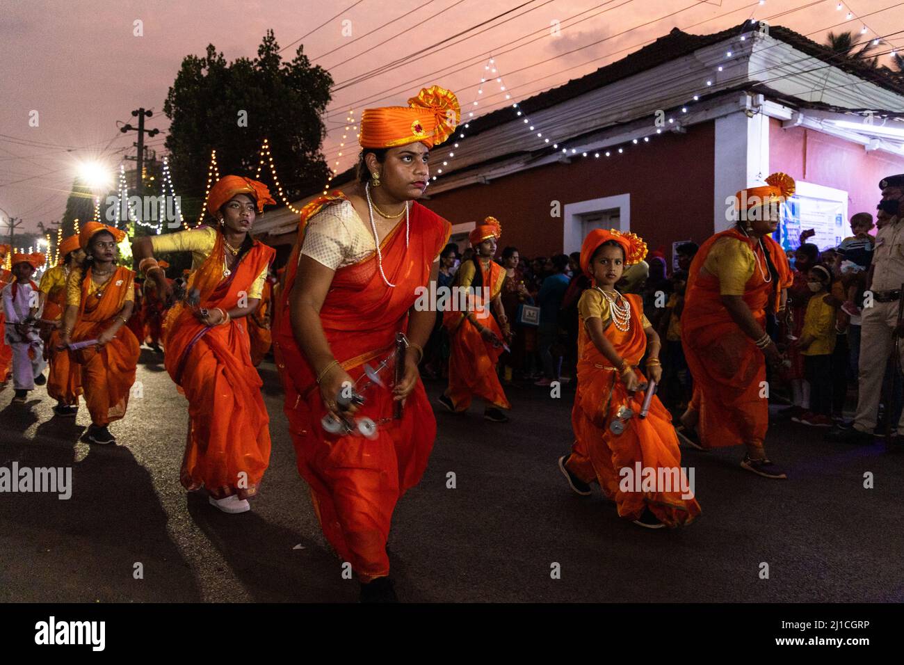 Group of women of all age groups, dancing while playing a musical ...