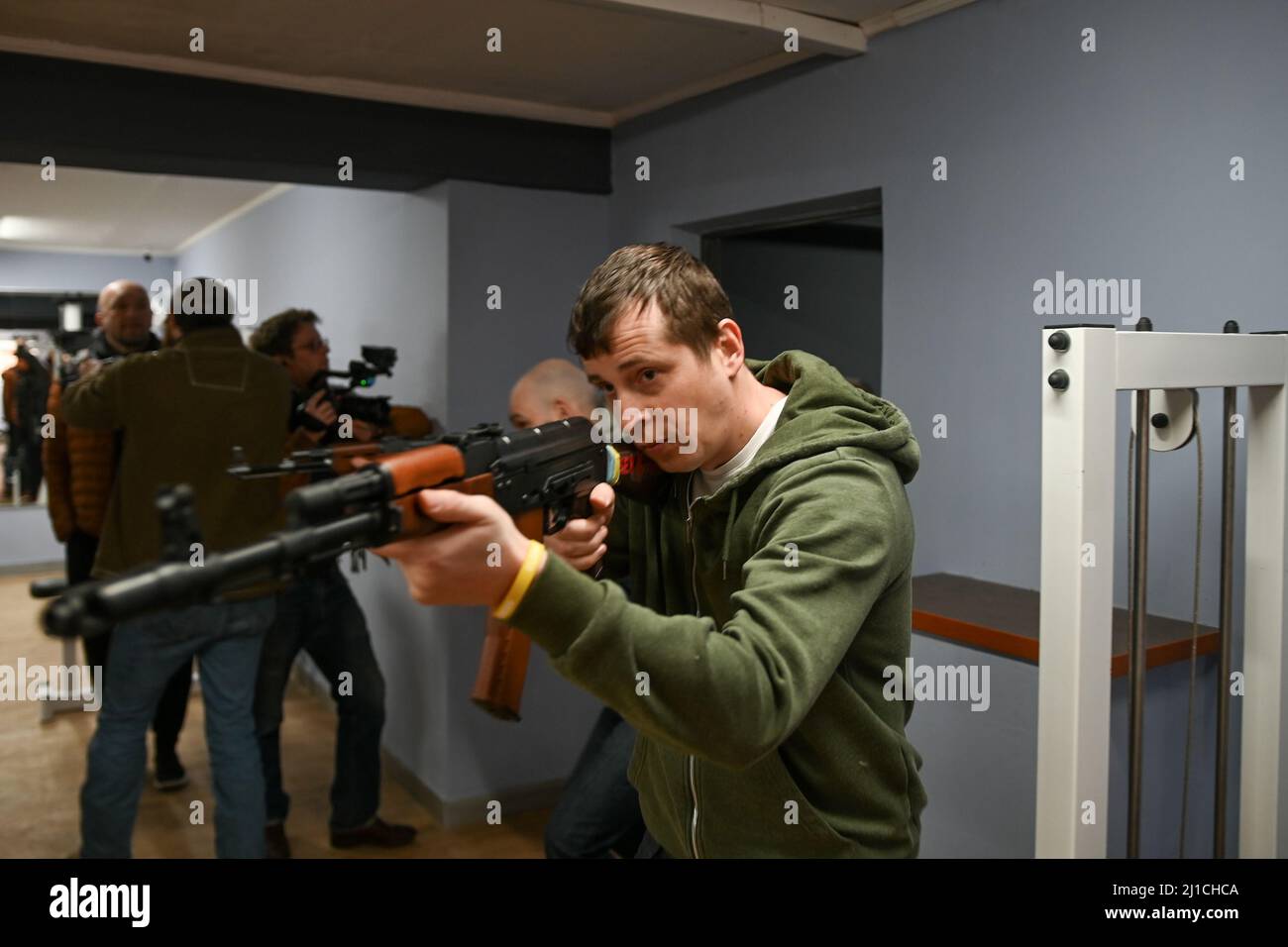 Civilian volunteers hoping to join local territorial defense forces in Lviv are trained in ...