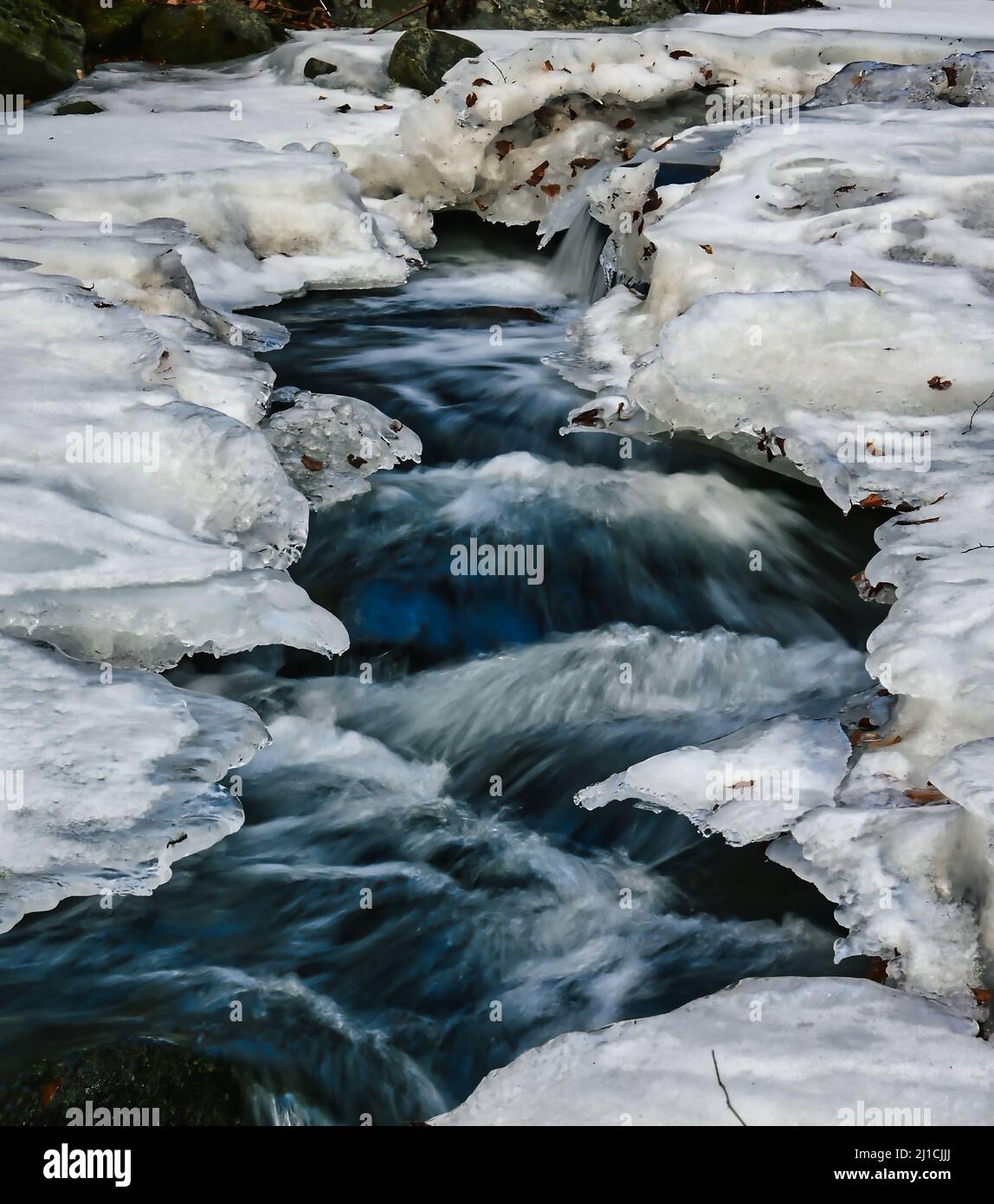 Icy river flowing to sea hi-res stock photography and images - Alamy