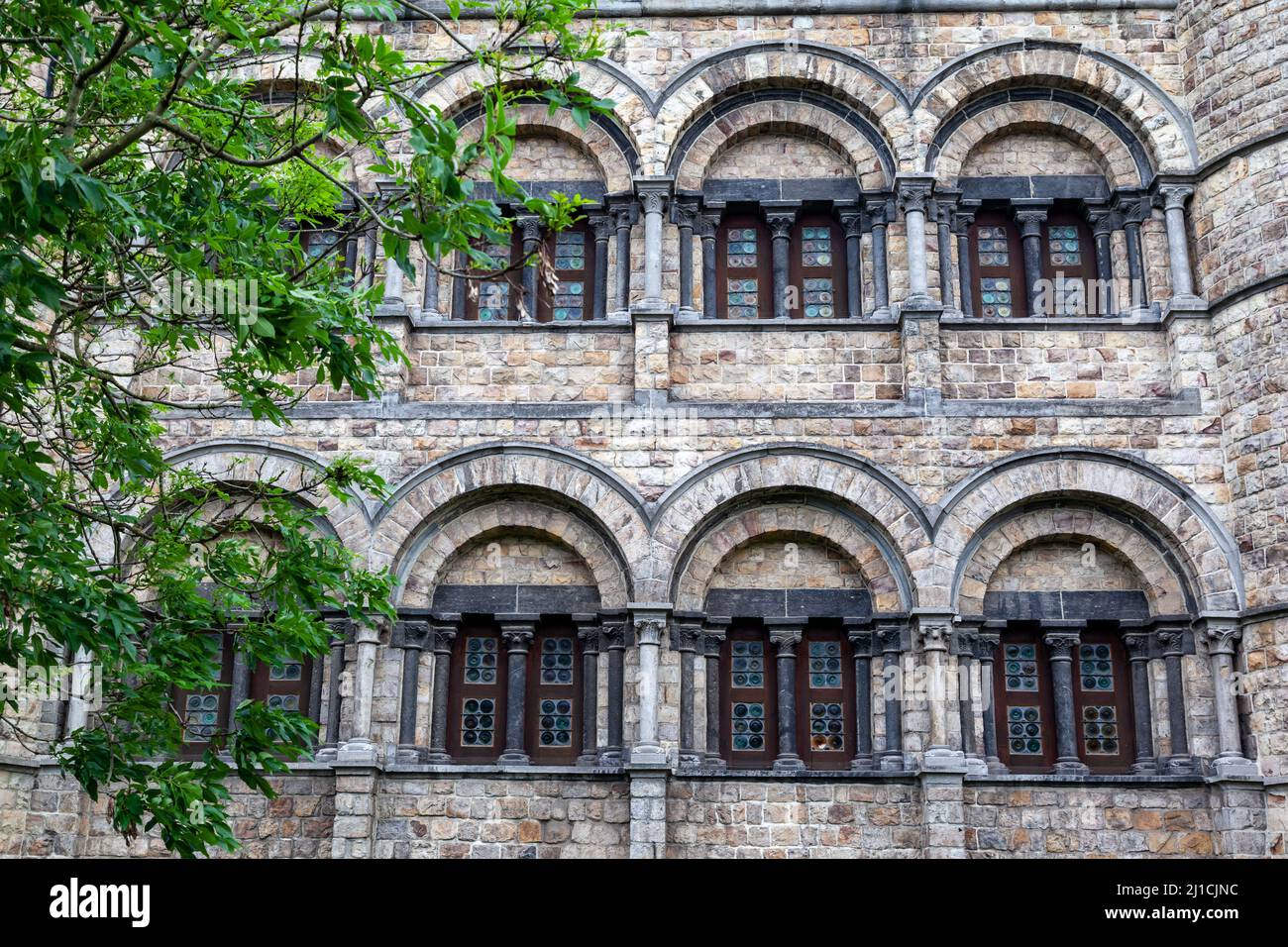 The facade of a historical buildings in Ghent, Belgium under the bright ...