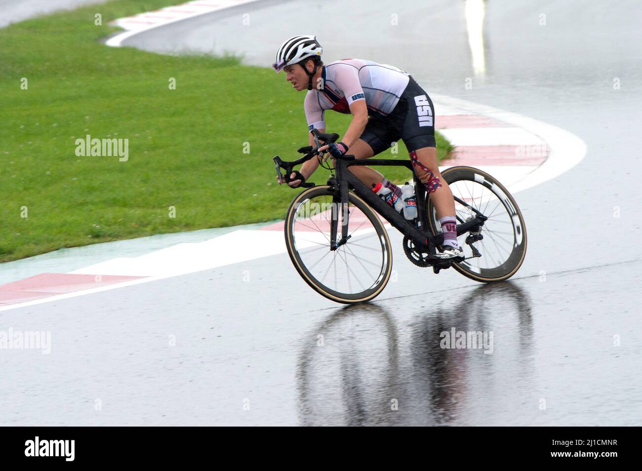Shawn Morelli of the United States rides through heavy rain during the ...