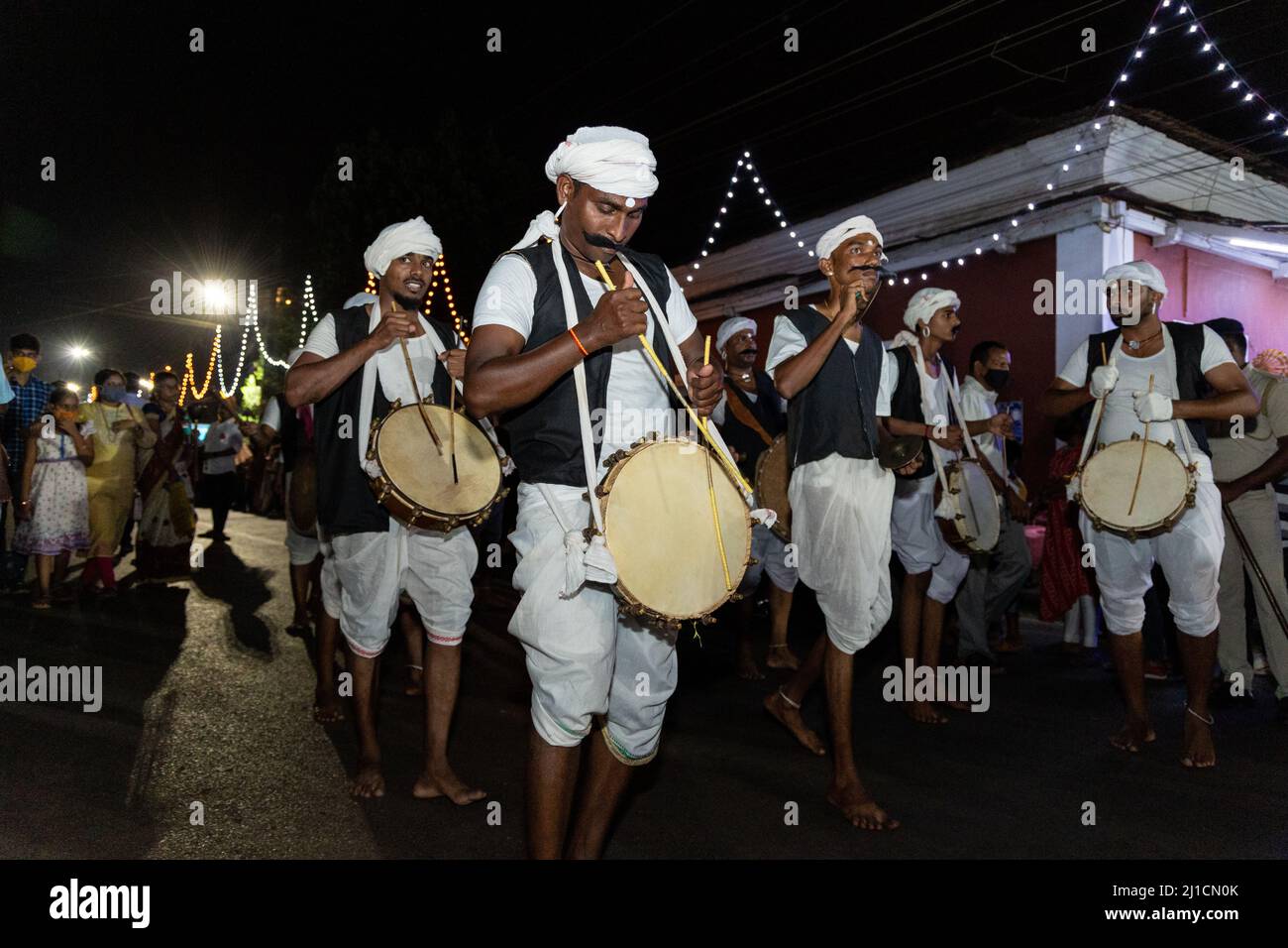 Group of villagers dressed in their traditional attire, showcasing ...