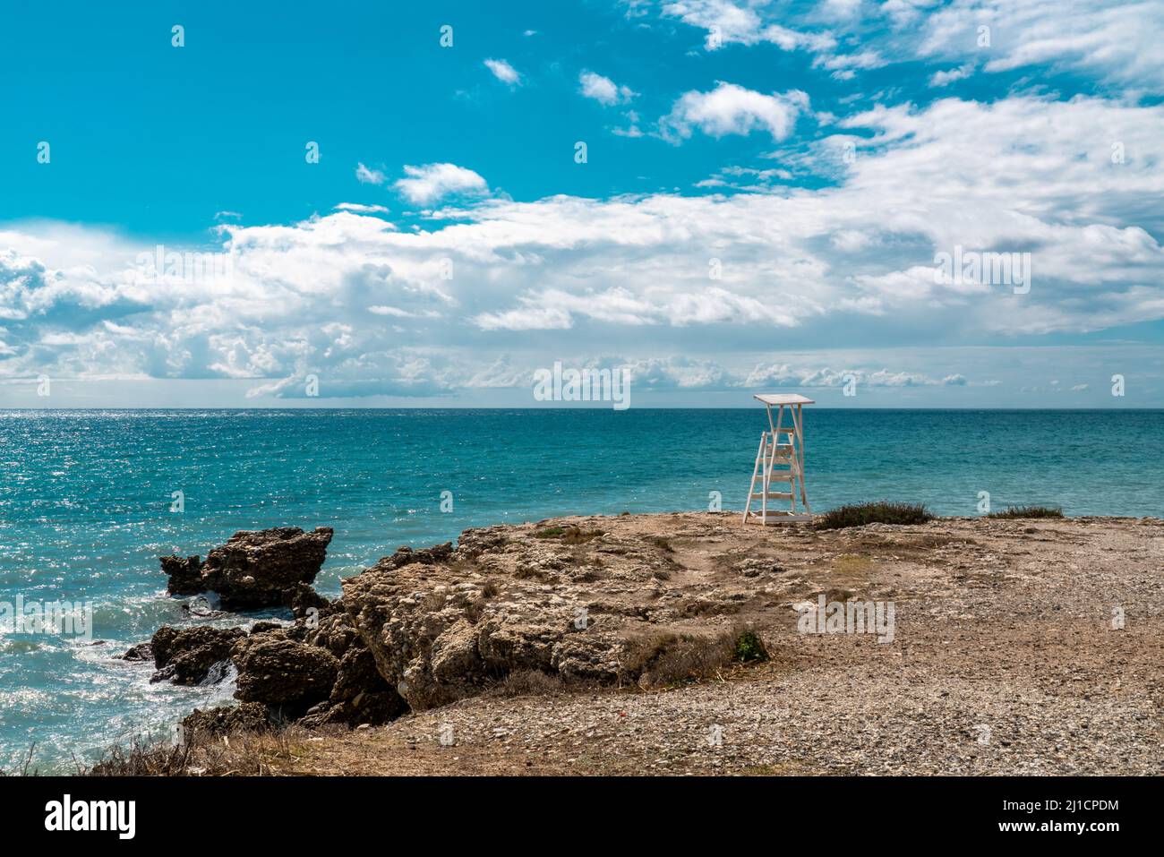 Isolated white safeguard post between two beaches in Torrox Costa area ...