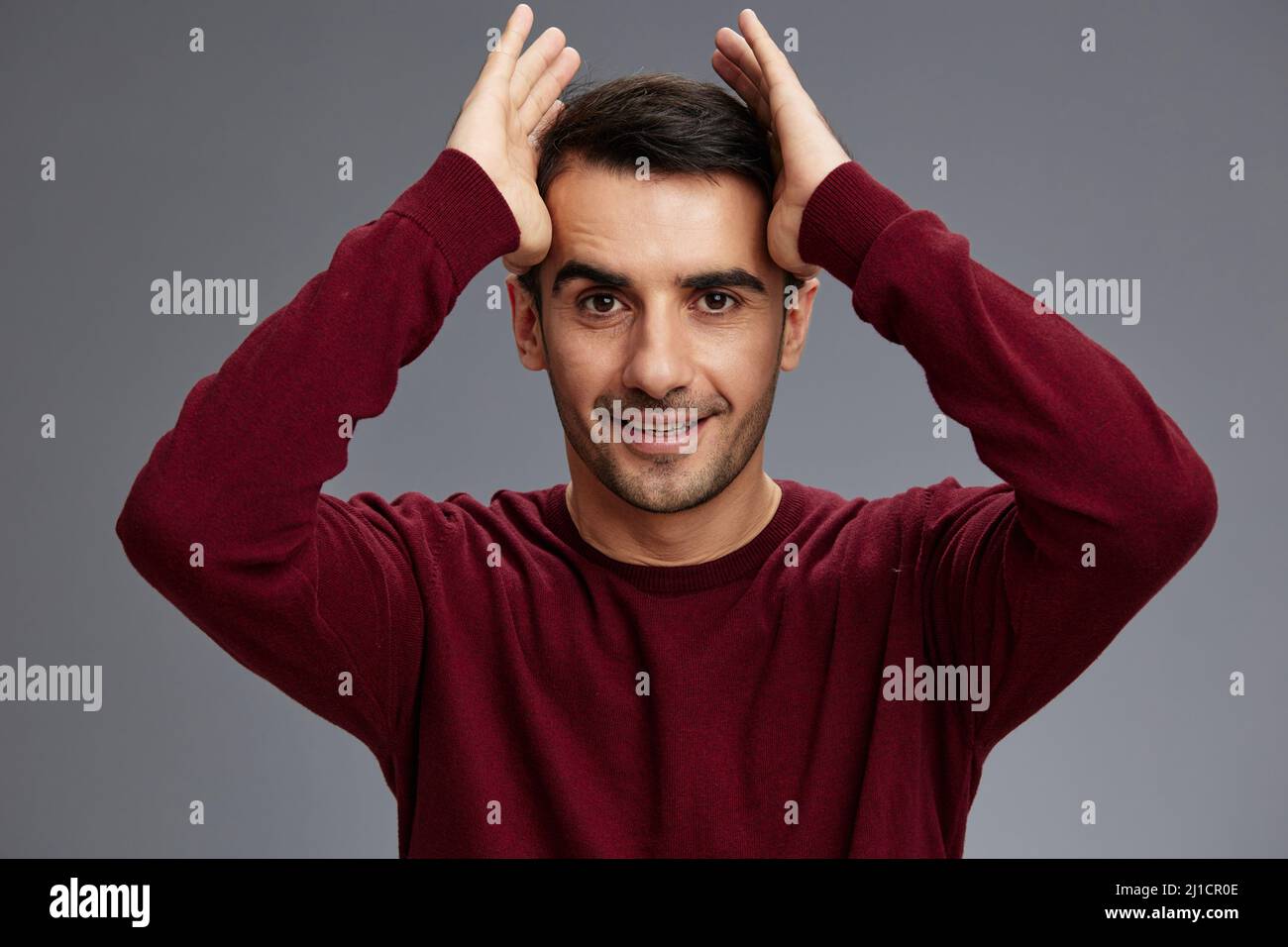 successful man in a sweater posing emotions elegant style cropped view ...