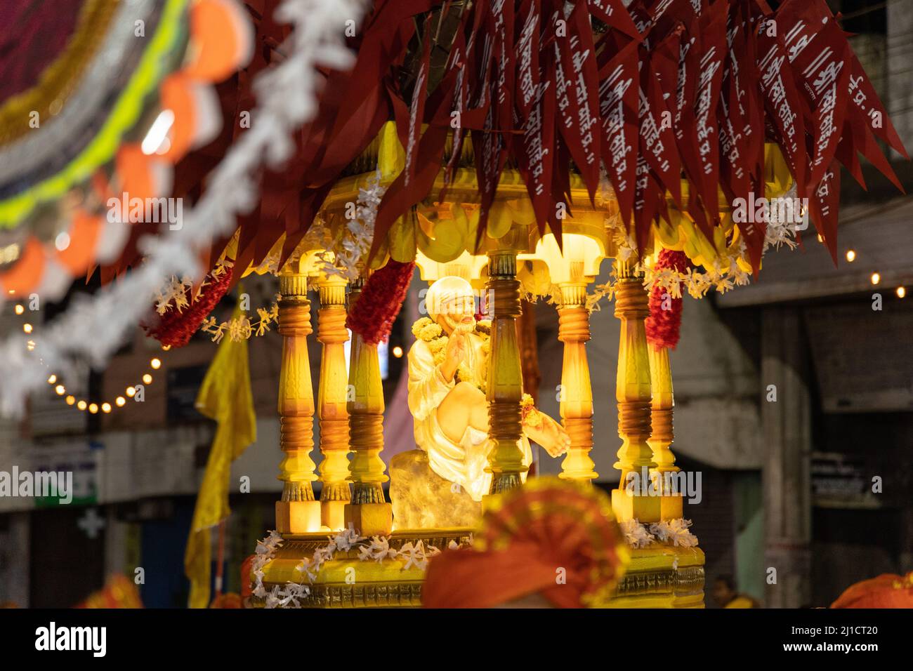 Idol of Shri Saibaba carried in palanquin at the Shigmo parade in Ponda ...