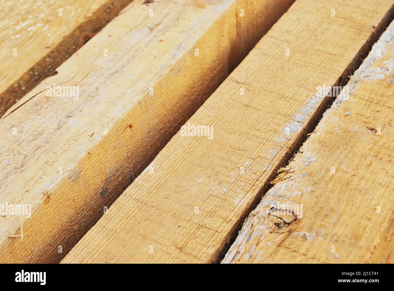 Pine lumber stacked in a row at the sawmill, lumber stack for storage ...