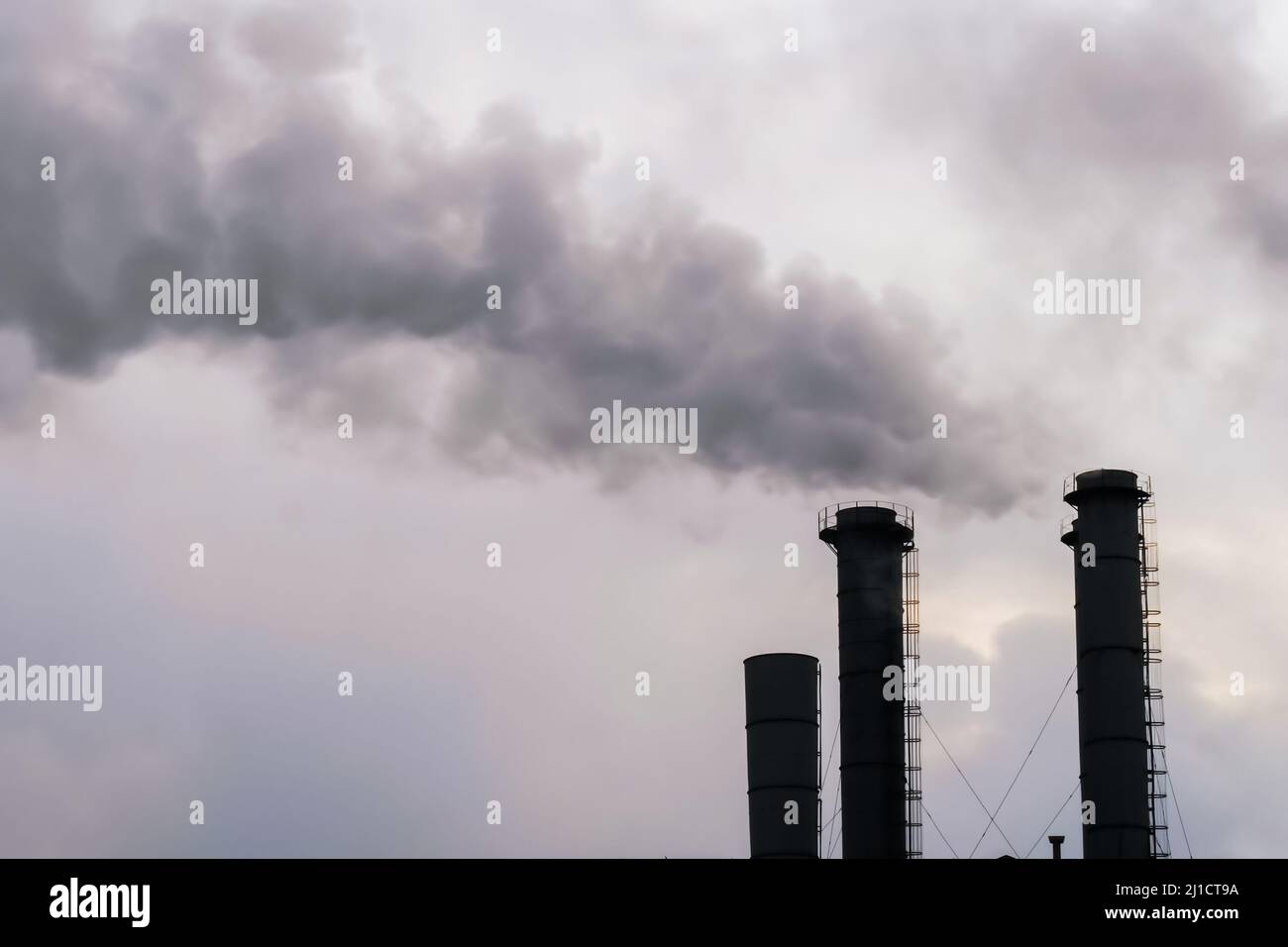 Environmental pollution - factory smokestack emitting smoke against ...