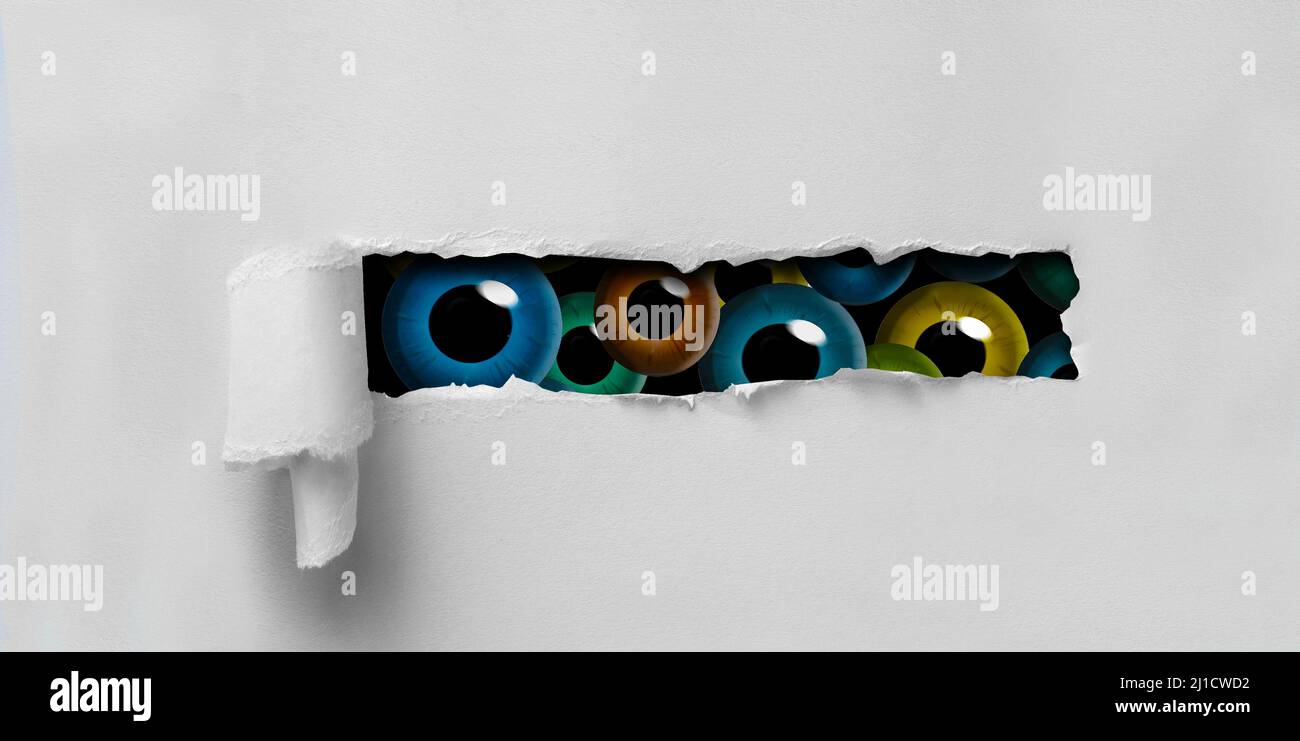 Eye looking through slot hi-res stock photography and images - Alamy